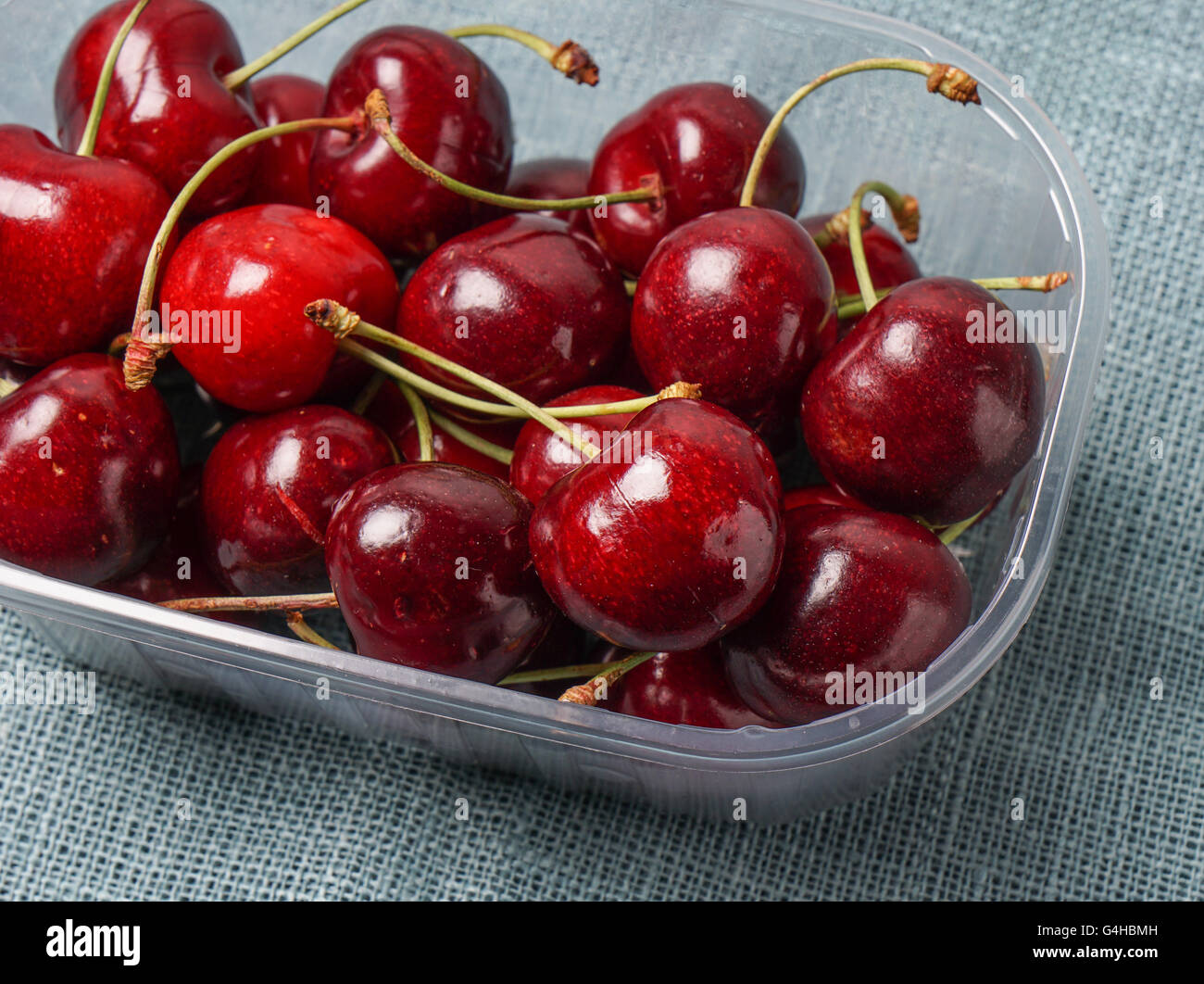 Delicious Fresh red organic Cherry, cherries in a plastic box Stock ...
