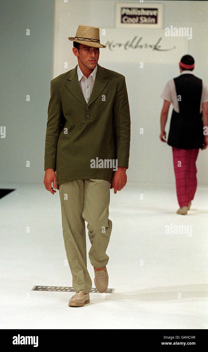 Fashion. Male model on catwalk in hat Stock Photo - Alamy