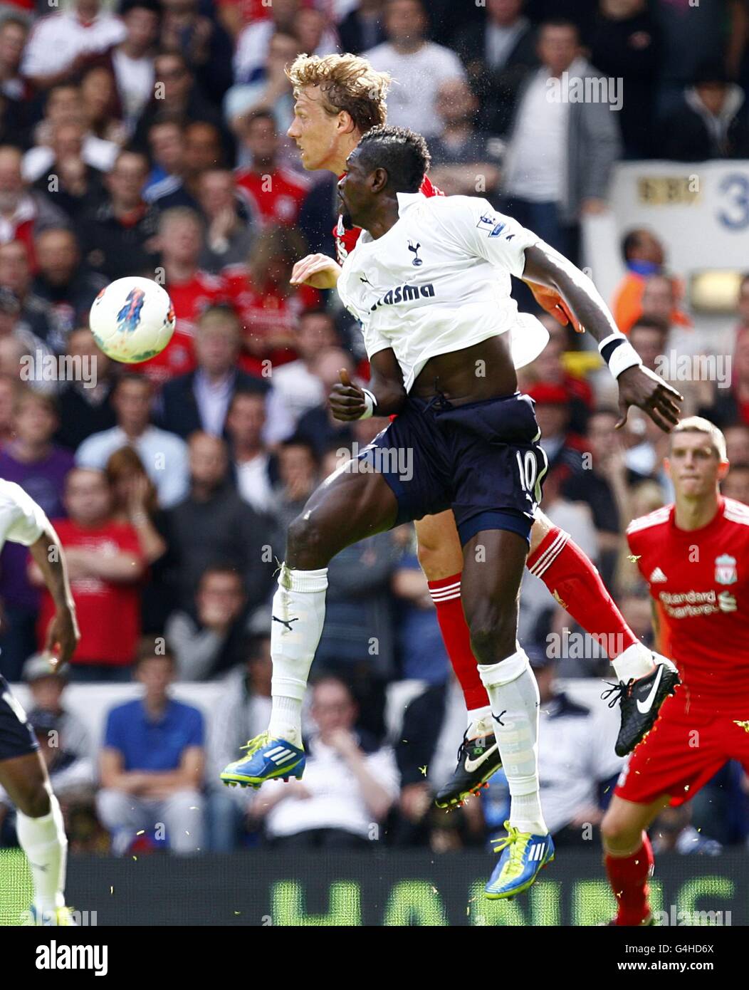 Tottenham Hotspur's Emmanuel Adebayor and Liverpool's Leiva Lucas (top ...