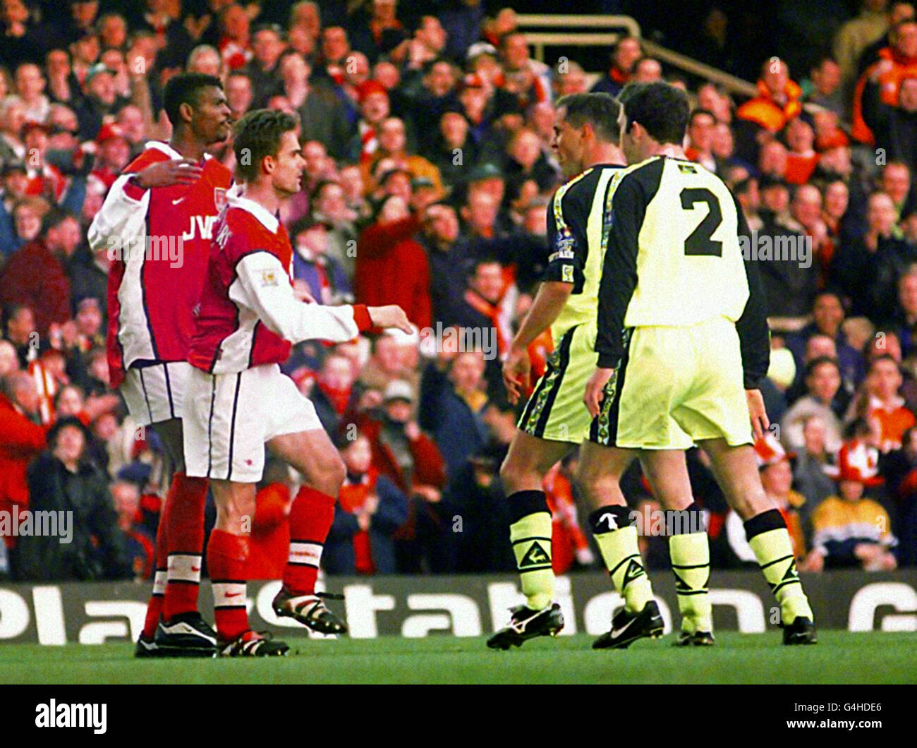 Arsenal's Marc Overmars (R) and Nwankwo Kanu confront the Sheffield ... Arsenal's Marc Overmars (R) and Nwankwo Kanu confront the Sheffield ...