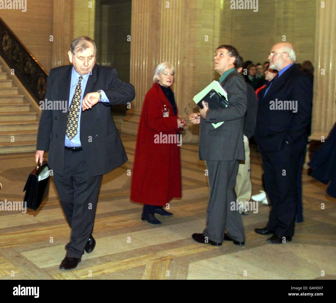 Joe Hendron of the SDLP makes his way in to the chambers as members of ...