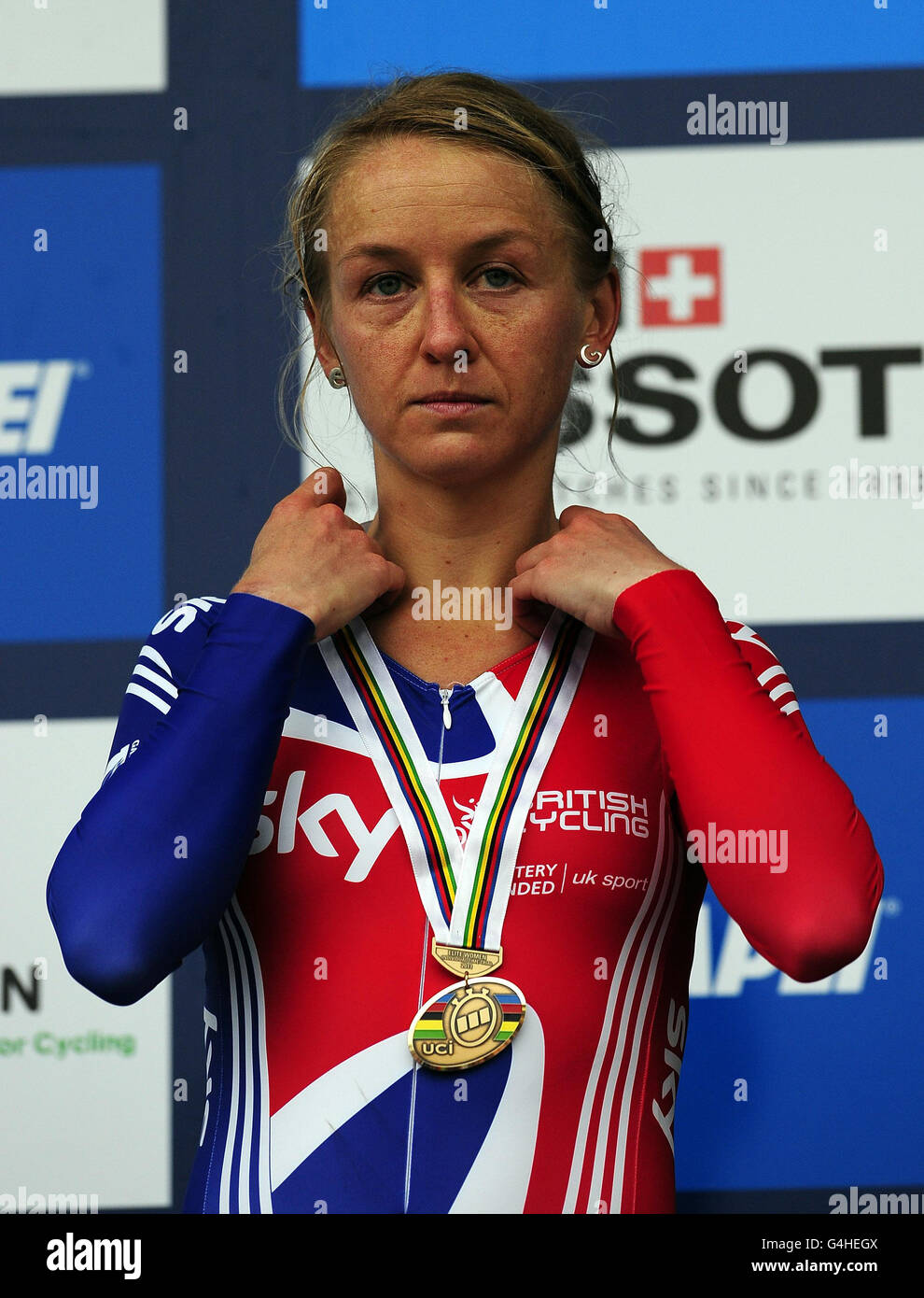 Great Britain's Emma Pooley accepts her bronze medal after failing to ...