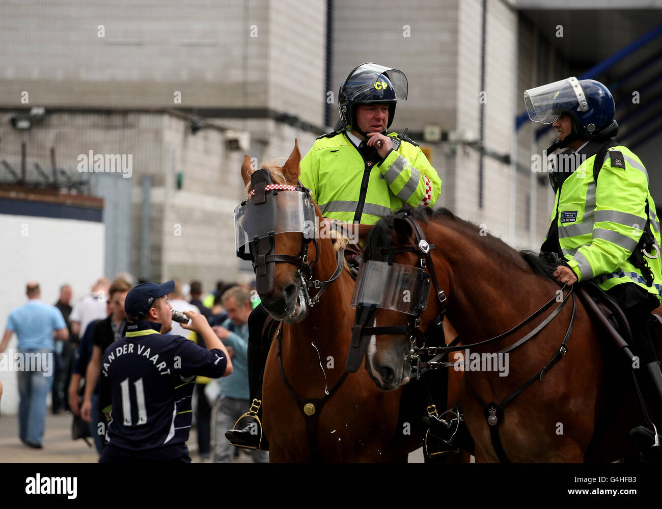 Mounted police officers patrol near white hart lane hi-res stock ...