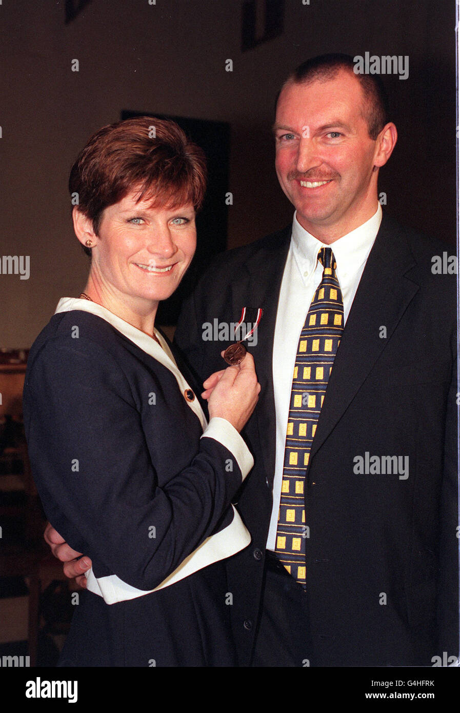 Ian Fearn from, Porthcawl, Mid-Glamorgan, and his wife Angela, pose for ...