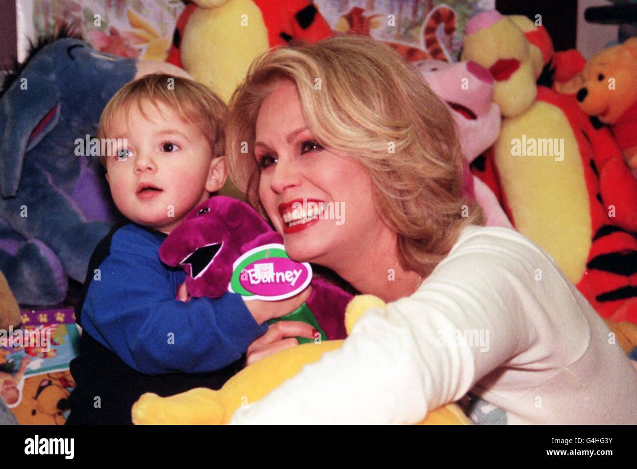 Actress Joanna Lumley and 20 month old Matthew Slopecki whose life was ...