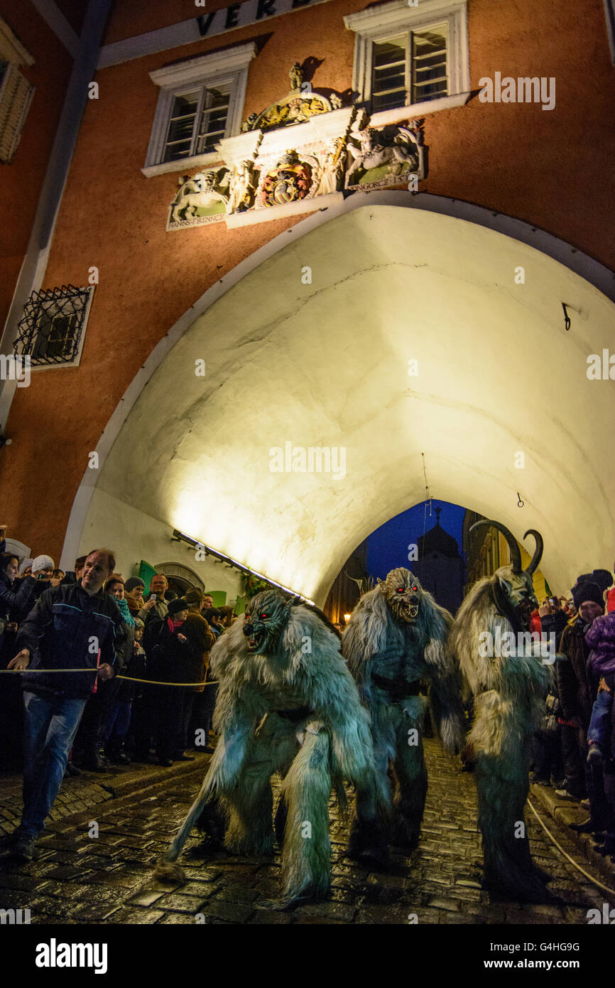 mask procession Perchtenlauf with Krampus at square Hauptplatz, house ...