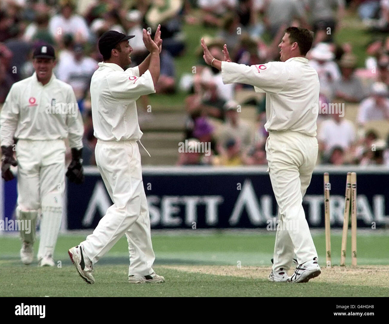 Darren Gough (right) is congratulated by teammate Mark Butcher after ...