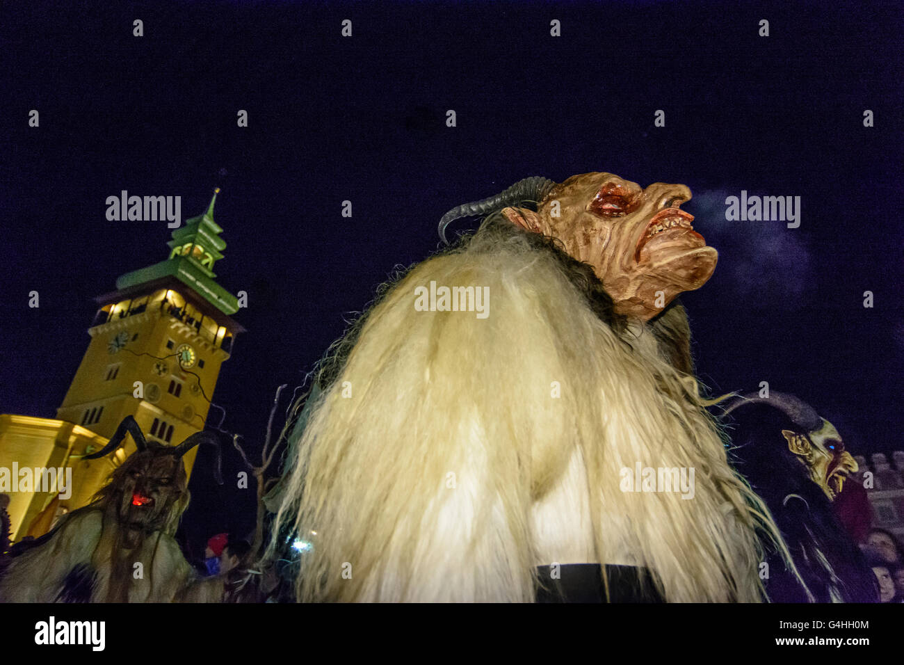 mask procession Perchtenlauf with Krampus at square Hauptplatz, town ...