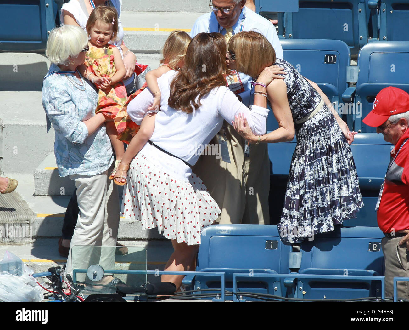 Roger Federer's wife Mirka, arrives with their twin daughters and ...