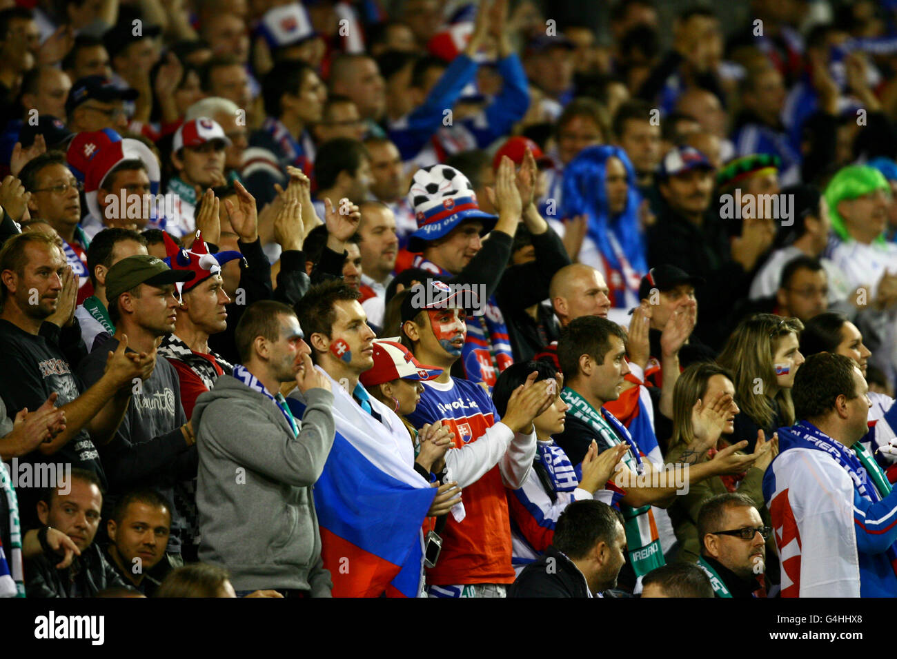 Slovakia fans cheer on their side in the stands hi-res stock ...