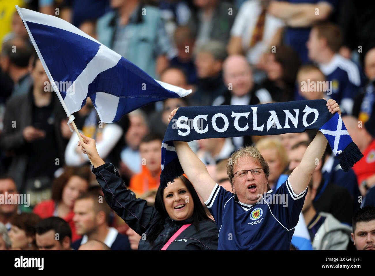 Two scotland fans show their support in the stands hi-res stock ...