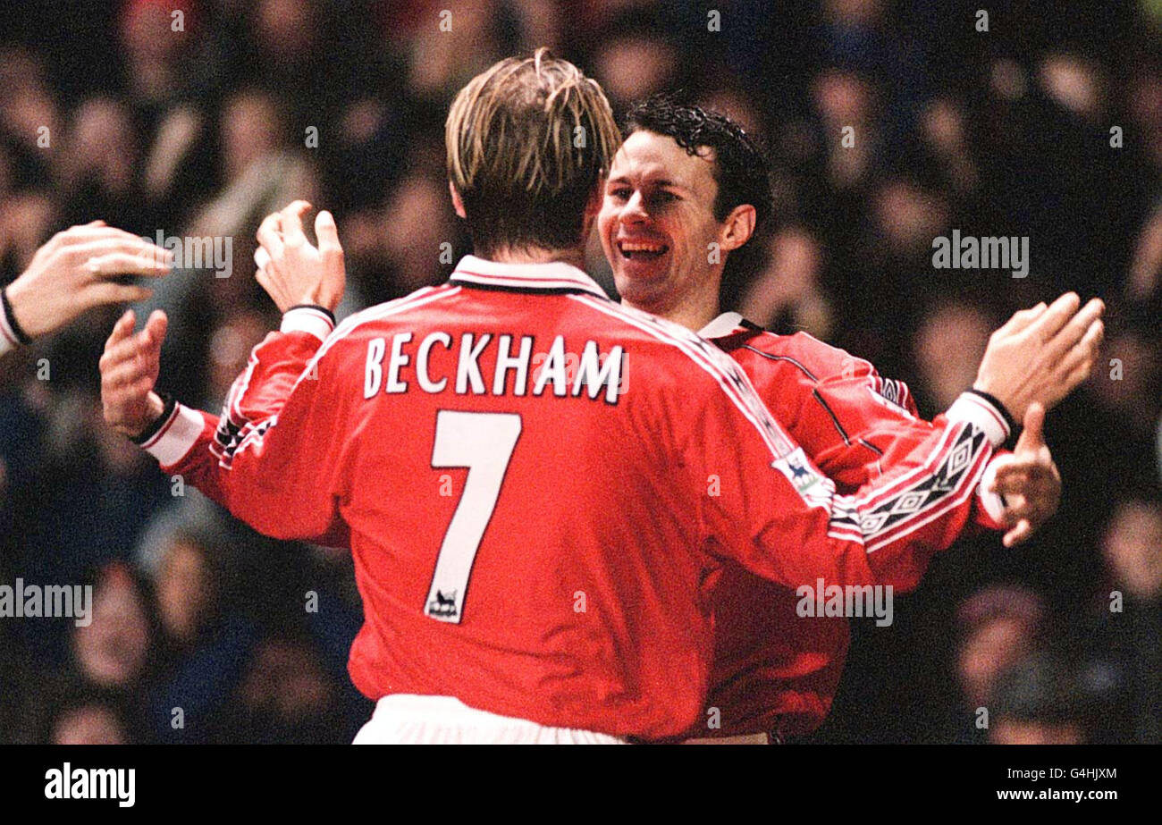 David Beckham congratulates Ryan Giggs after he scores for Manchester ...