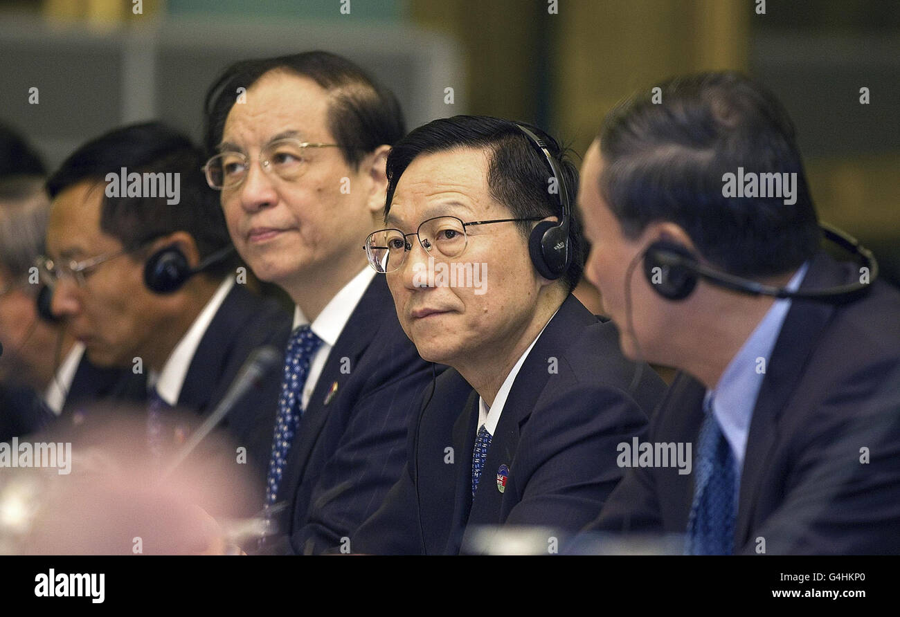 Vice Premier of China Wang Qishan (right) China's Finance Minister Xie ...