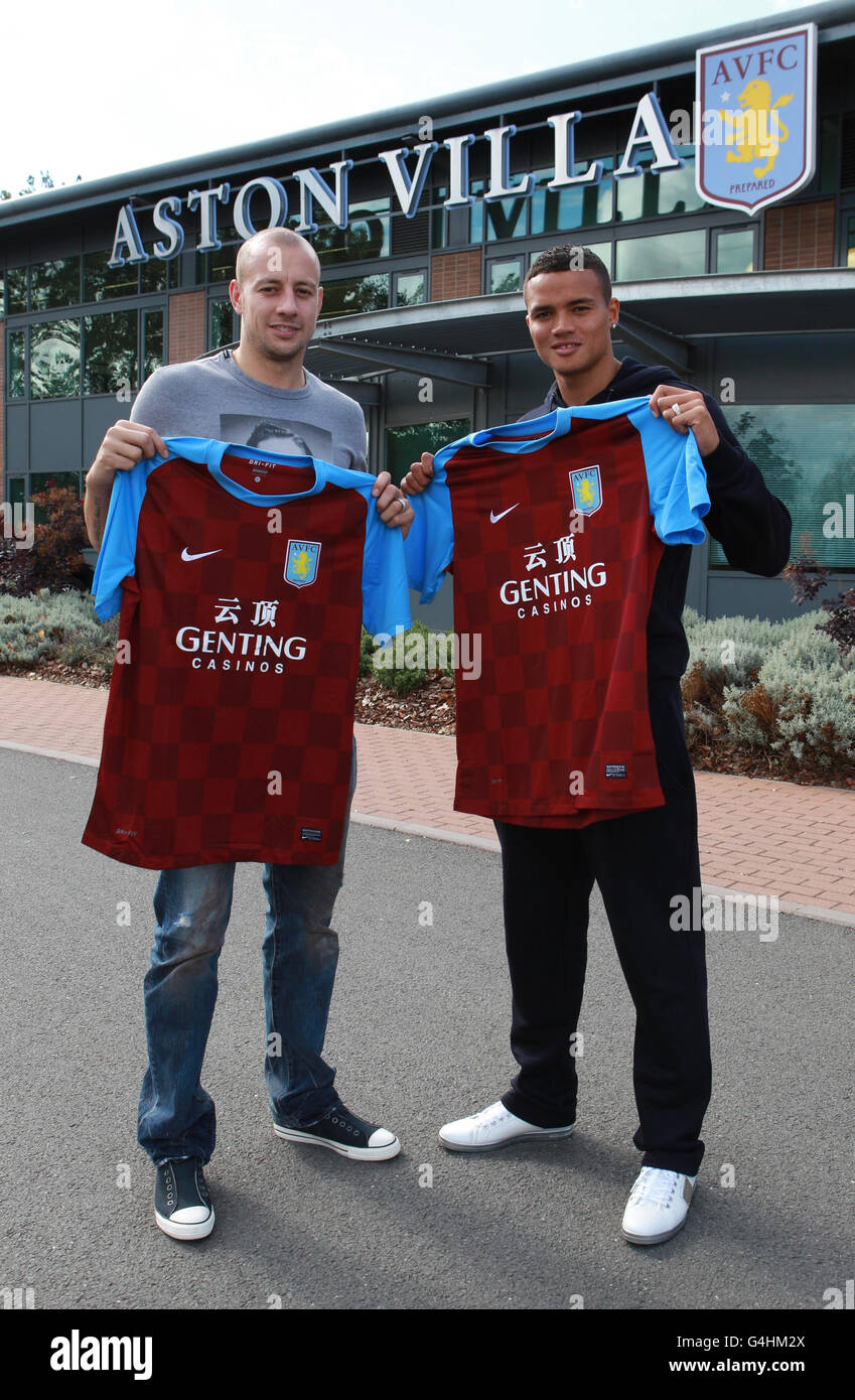 Aston Villa's new signing Alan Hutton and Jermaine Jenas (right) pose ...