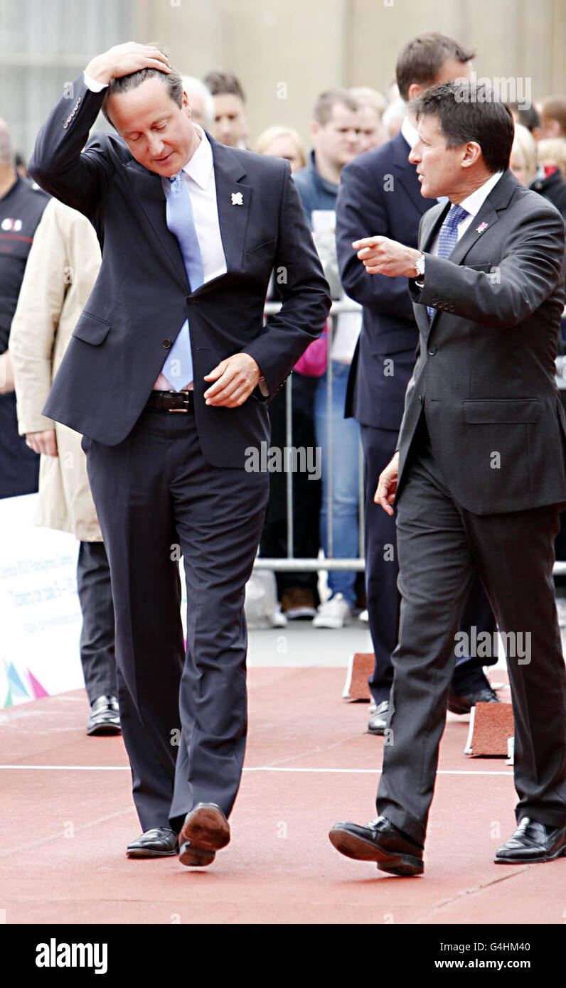 Prime Minister David Cameron and Lord Coe (right) attend the ...