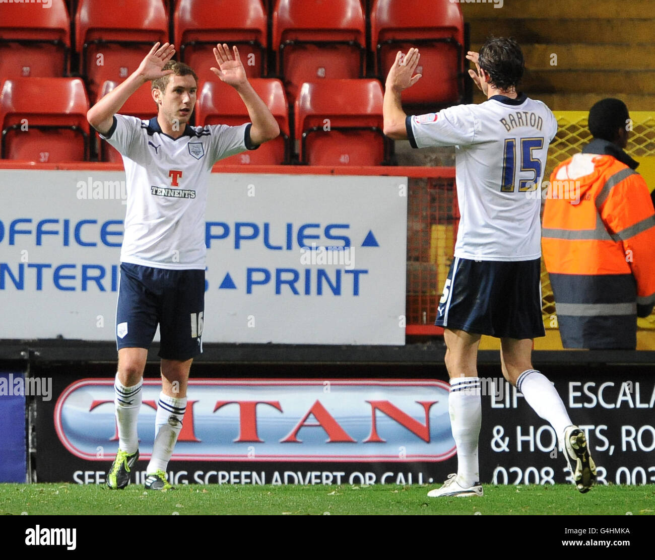 Preston North End's Danny Mayor (left) celebrates his goal against ...