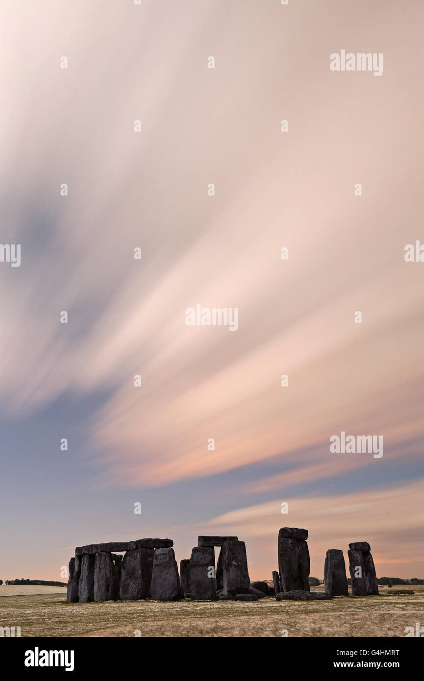 Long exposure creating movement in a dramatic sky above the megalithic ...