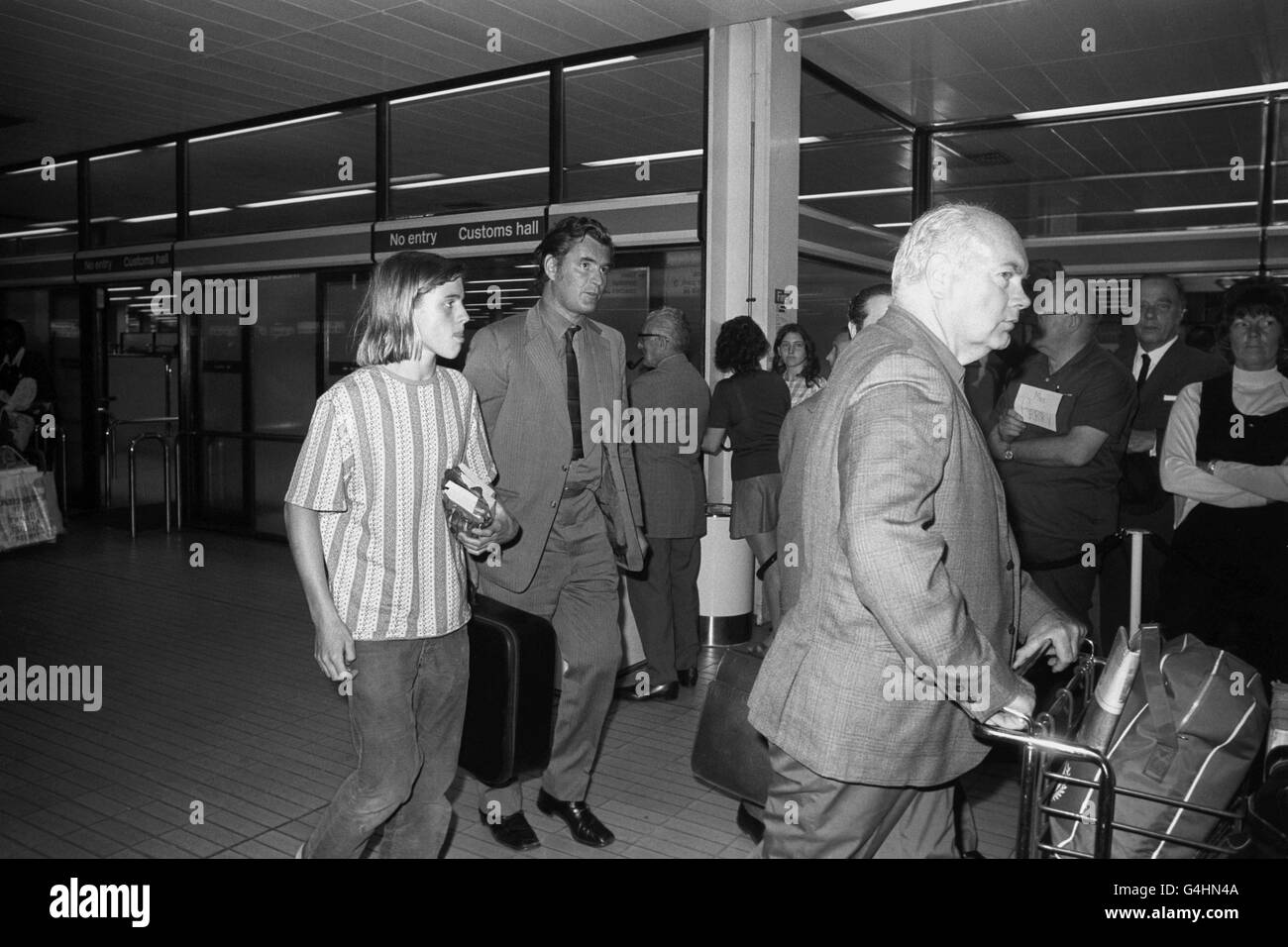 Child following Black and White Stock Photos & Images - Alamy