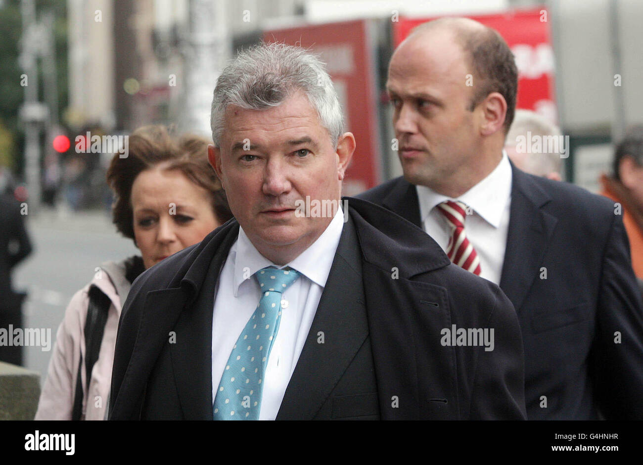 Richie Boucher (front), Chief Executive Officer of the Bank of Ireland ...