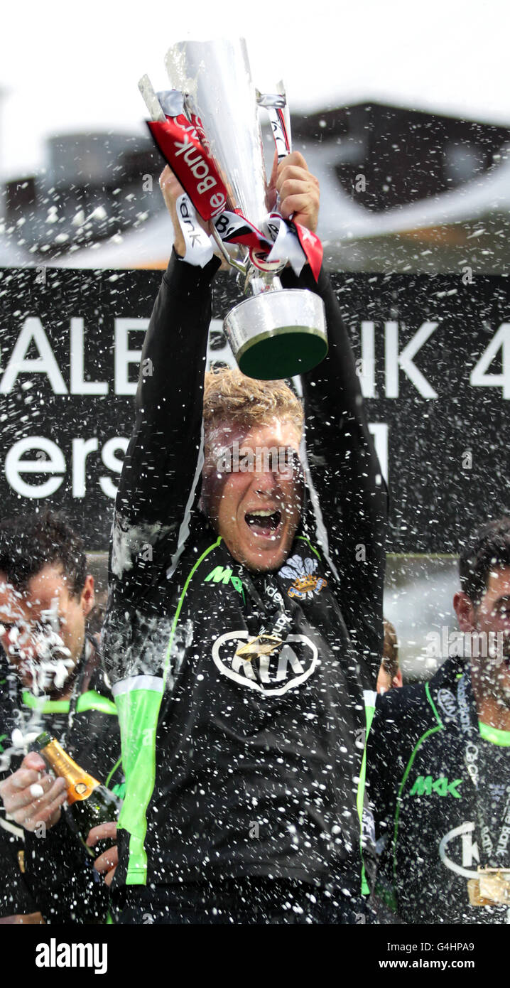 Surrey's Rory Hamilton-Brown lifts the Trophy after the Clydesdale Bank ...
