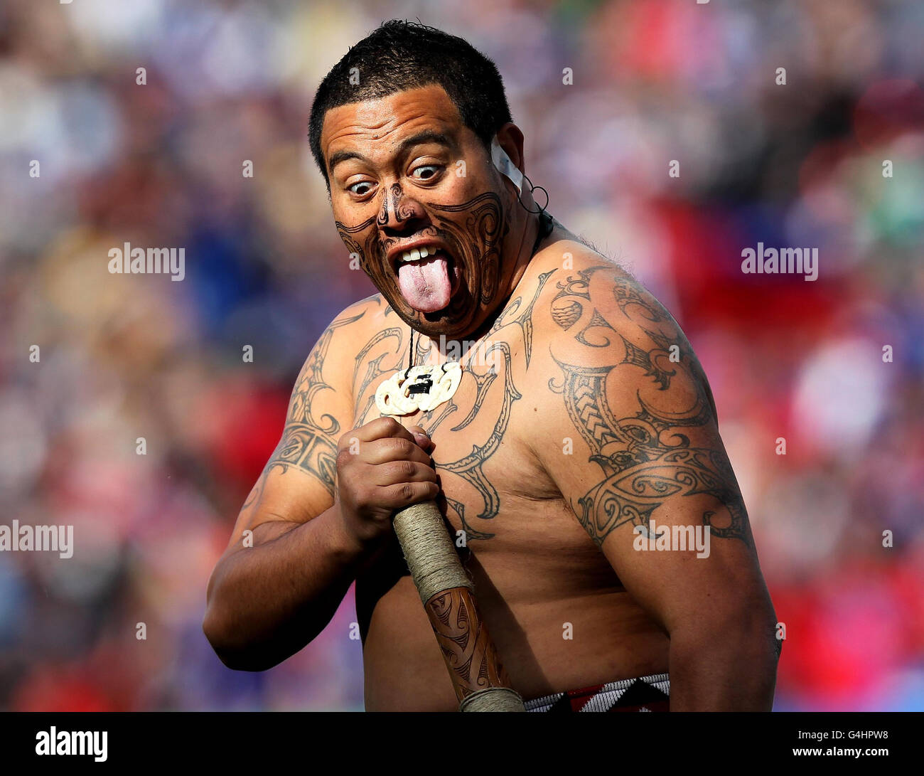 A Maori Warrior welcomes the teams before the Pool D Match at the ...