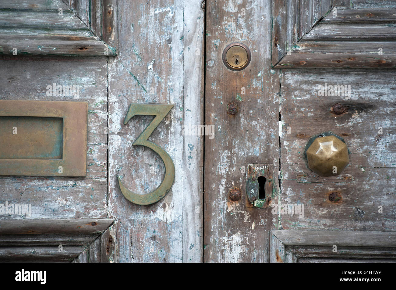 Old Door with letterbox, keyhole and number 3 Stock Photo - Alamy