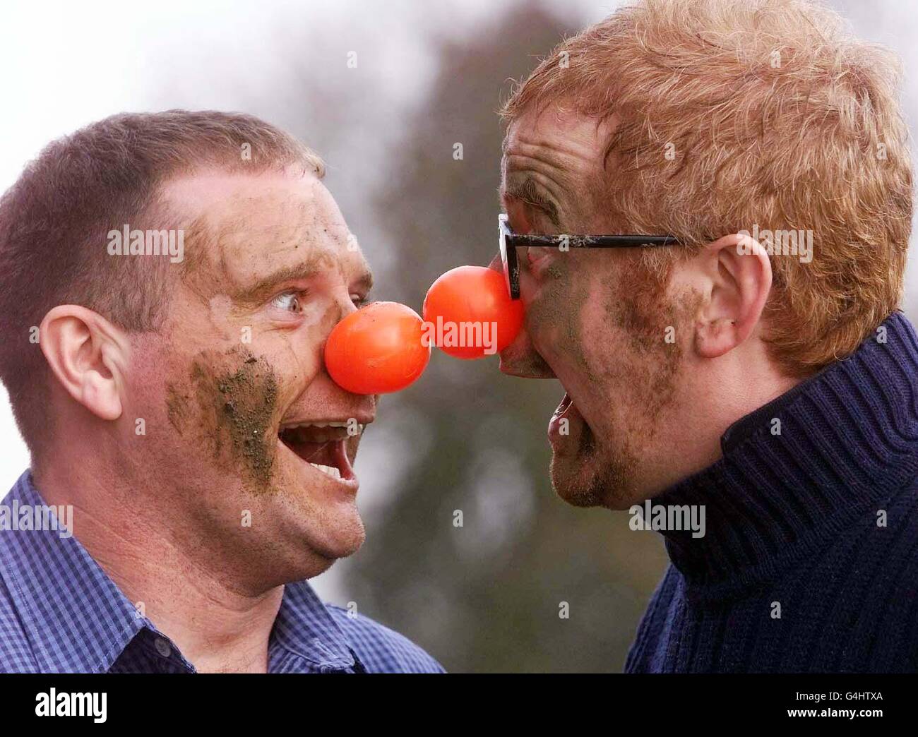 Middlesbrough football star Paul Gascoigne (right) puts on a red nose ...