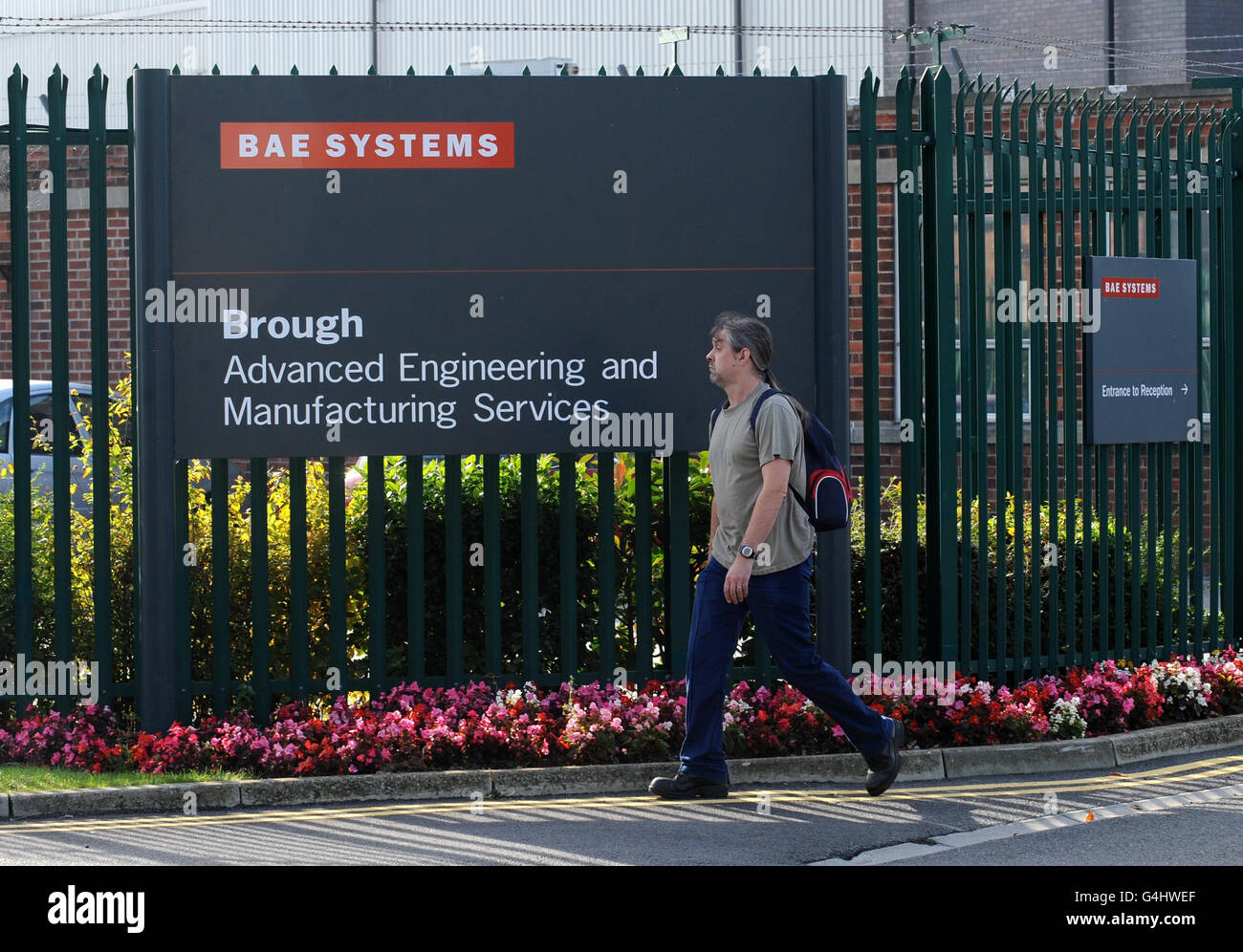 A worker leaves bae systems plant in brough hi-res stock photography ...