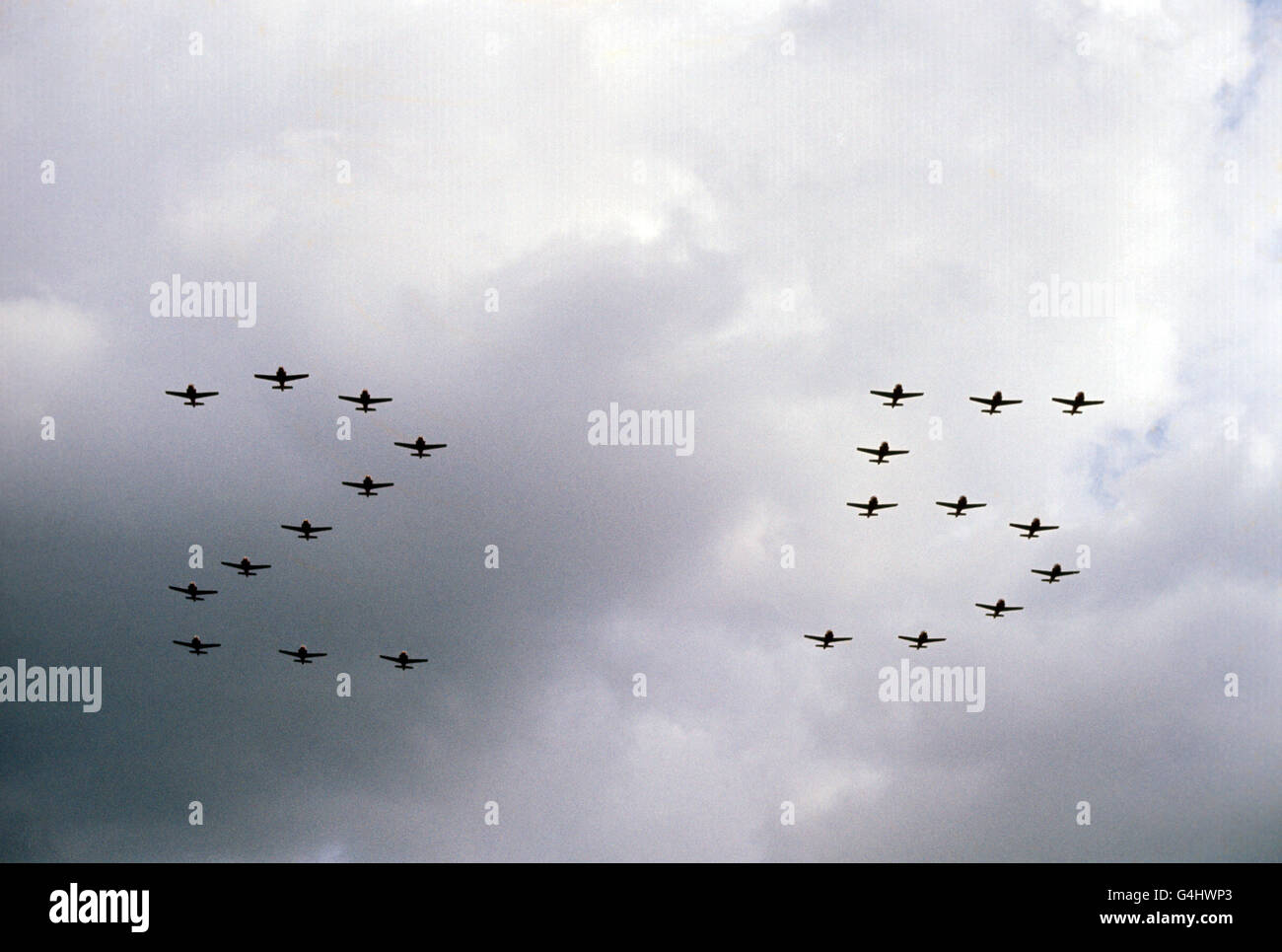 An RAF formation create the number 25 in a fly past at the Royal Review ...