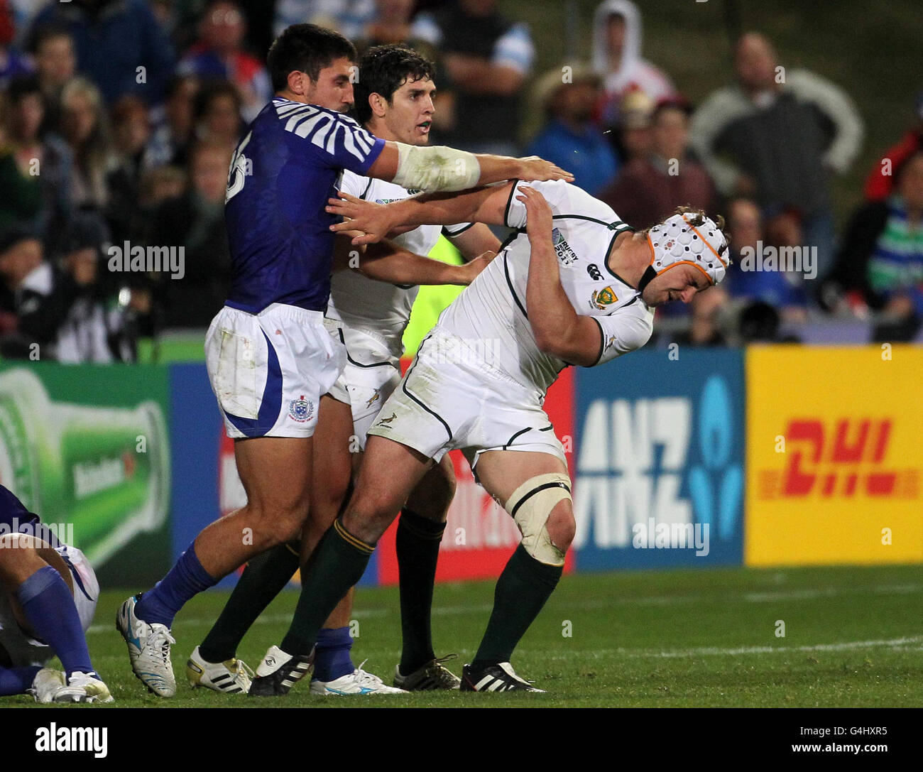 Samoa's Paul Williams (left) confronts South Africa's Heinrich Brussow ...