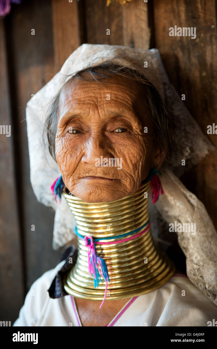 Portrait of an old Kayan Lahwi (Padaung) woman with brass coils rings ...
