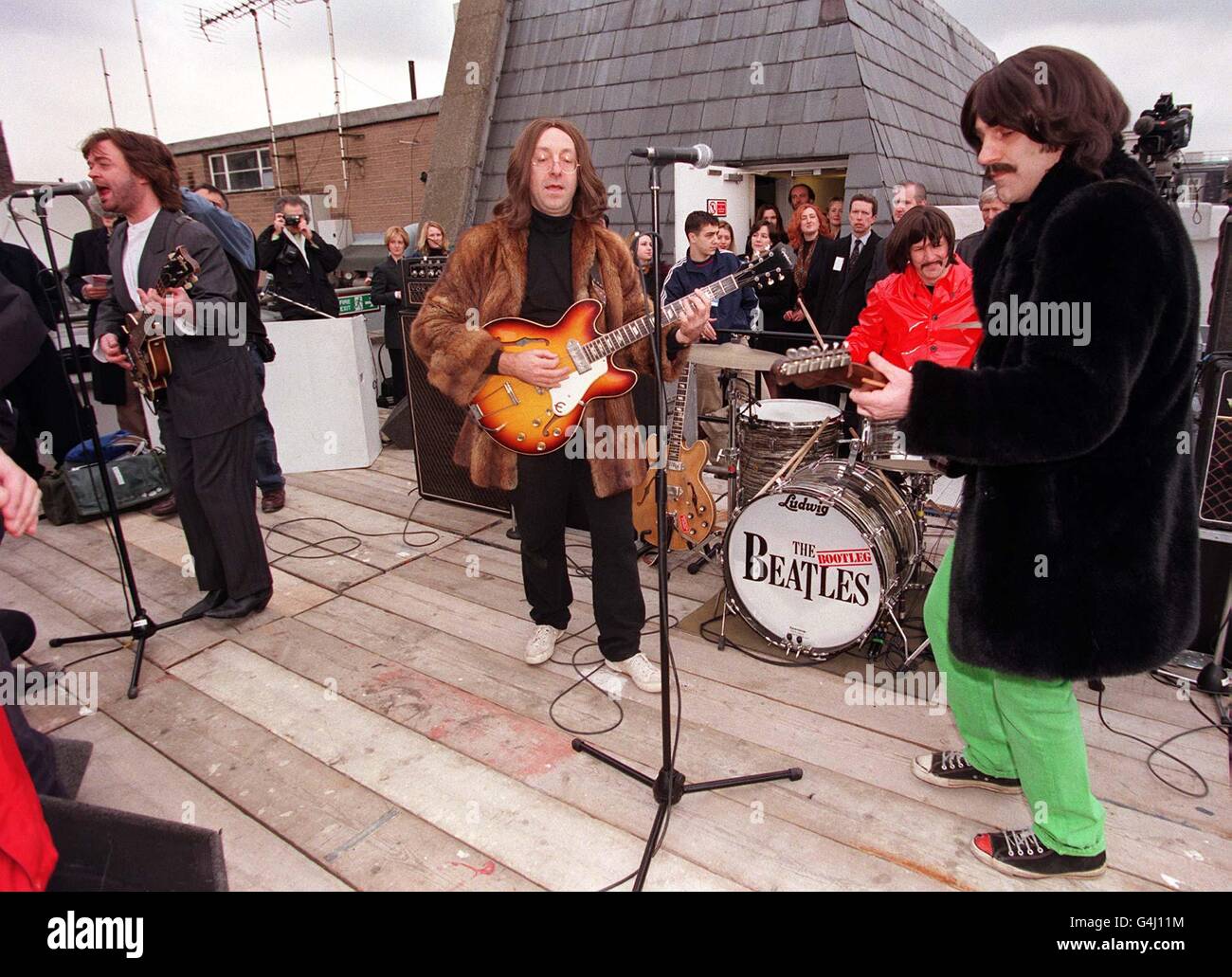 Bootleg Beatles play on roof Stock Photo - Alamy