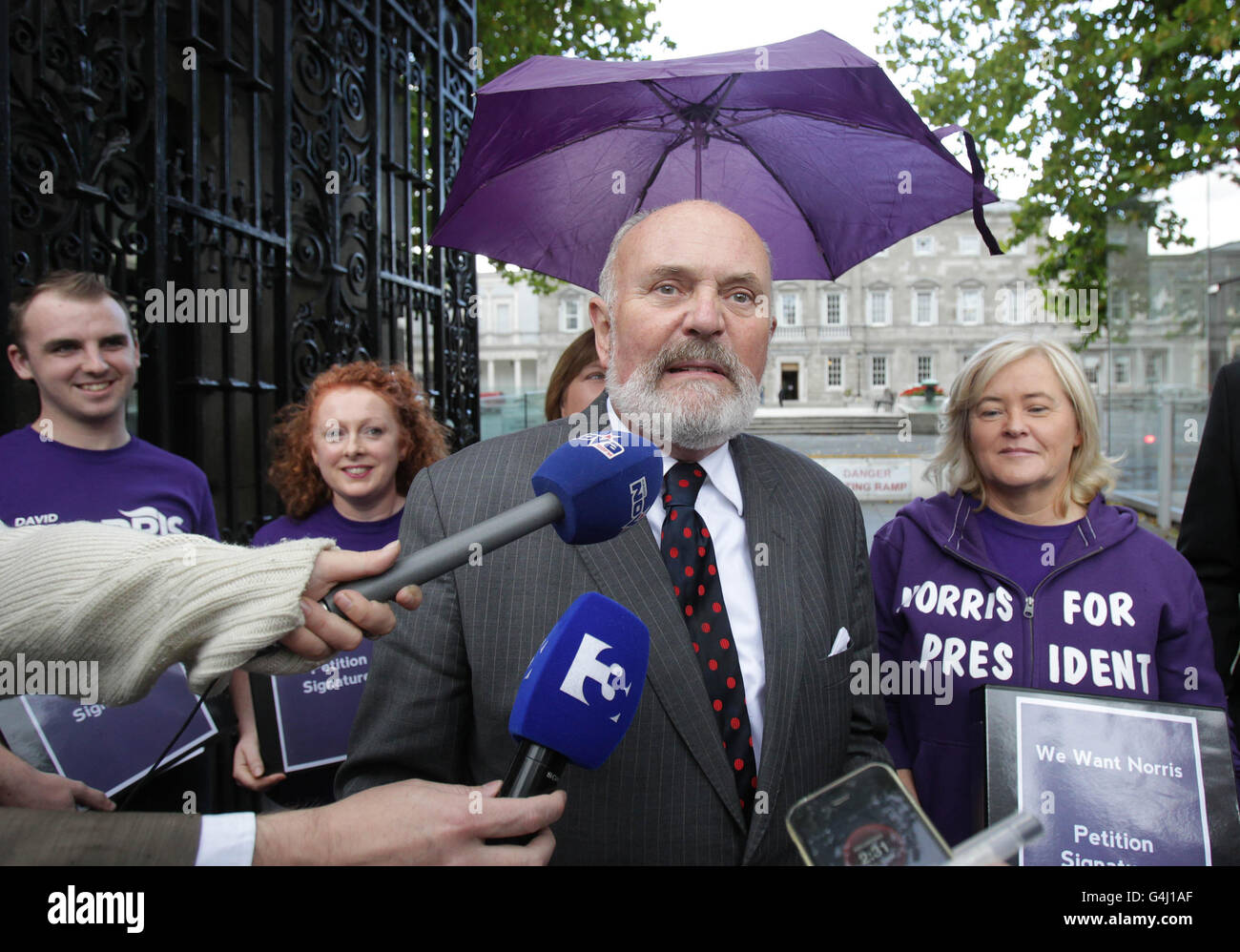 Senator David Norris outside Leinster House as he meets supporters with ...