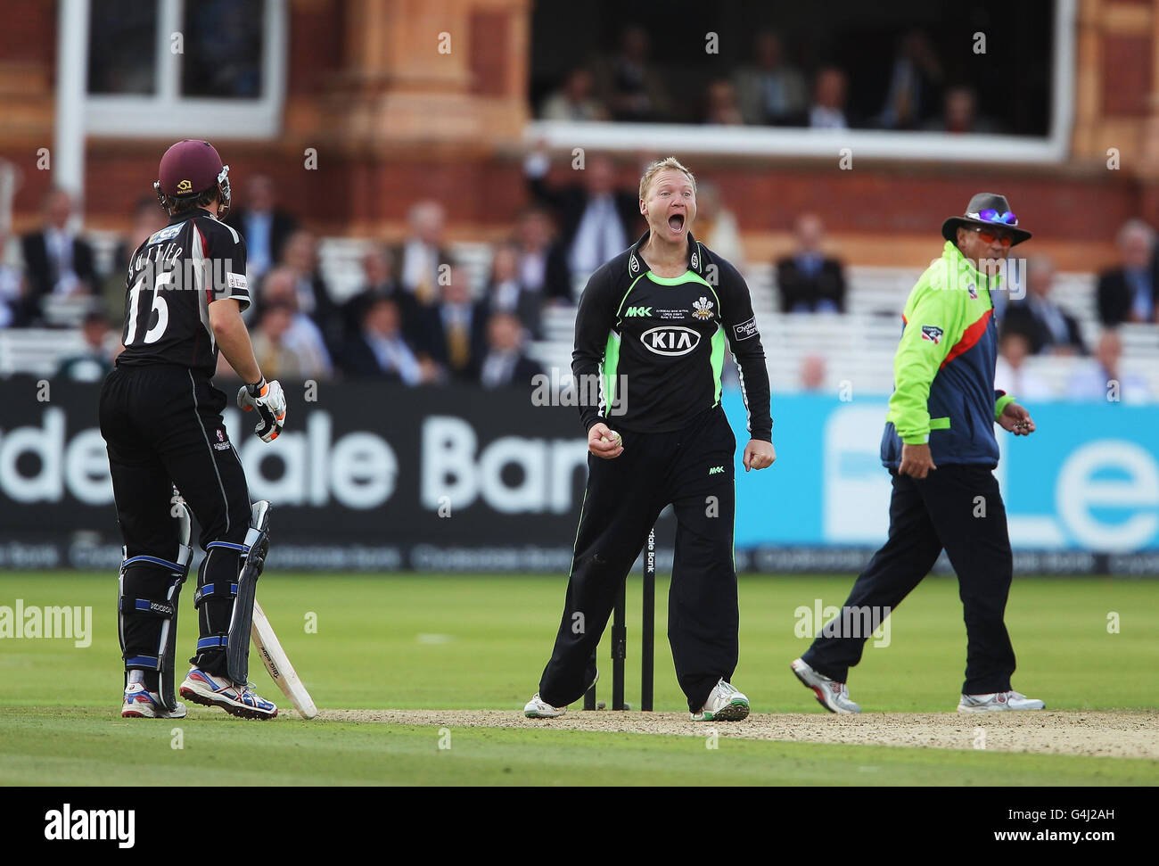 Surrey's Gareth Batty celebrates making a catch from his own bowling ...