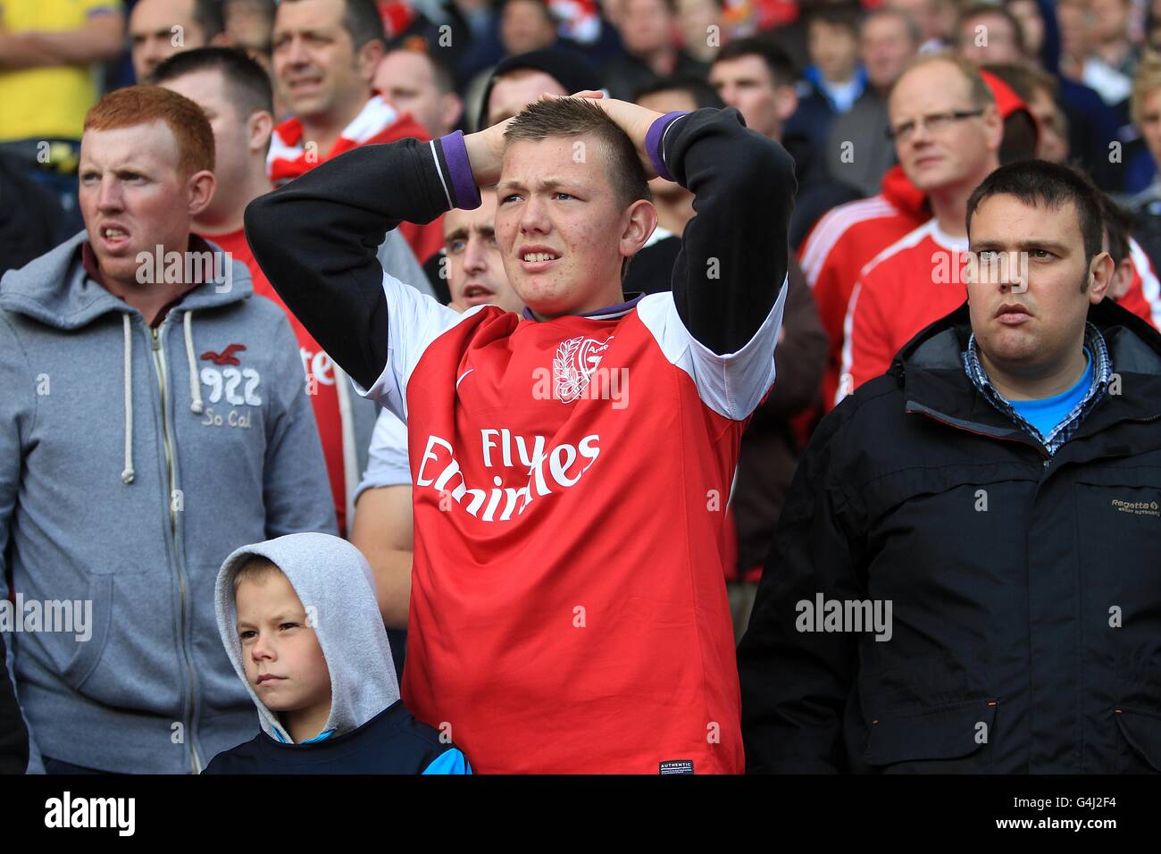 Arsenal fans show their frustration in the stands hi-res stock ...