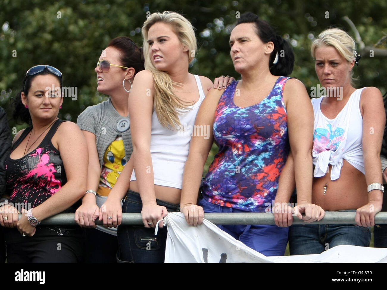 Travellers protest from a platform from the front gate at Dale Farm ...
