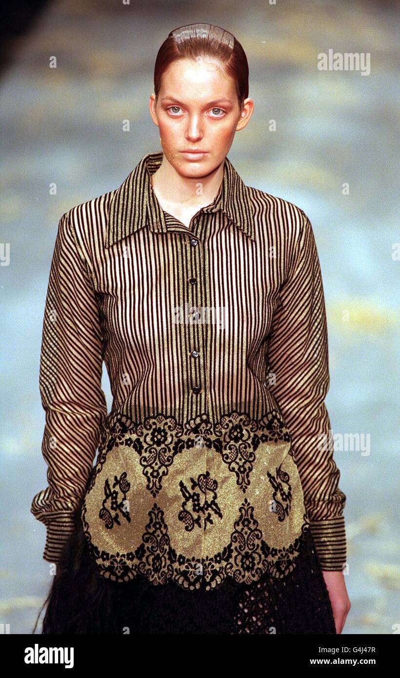 A model presents a creation from designer Andrew Groves during his show ...