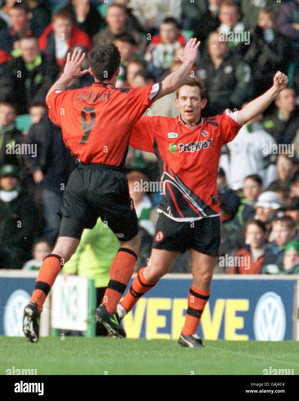 Dundee United's Billy Dodds (right) celebrates his first goal with his ...