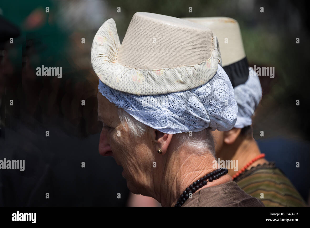 Women wearing traditional lace bonnets in the town of Hoorn on the ...