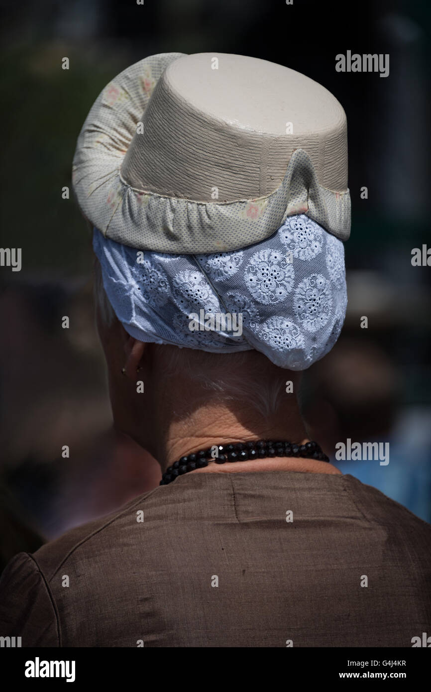 Woman wearing traditional lace bonnet in the town of Hoorn on the ...