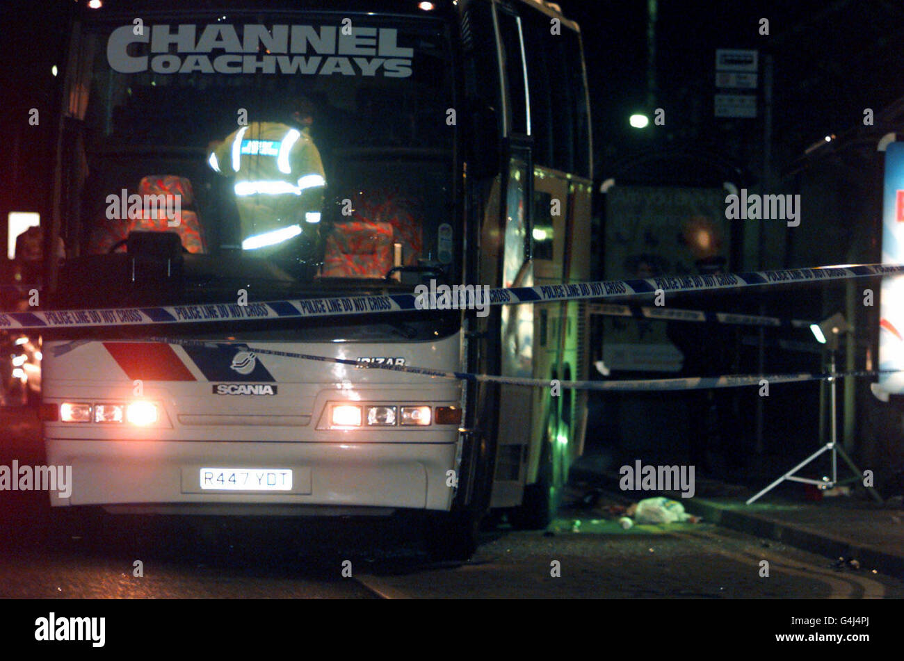 Scene of accident coach bus reflective jacket police line landscape hi ...