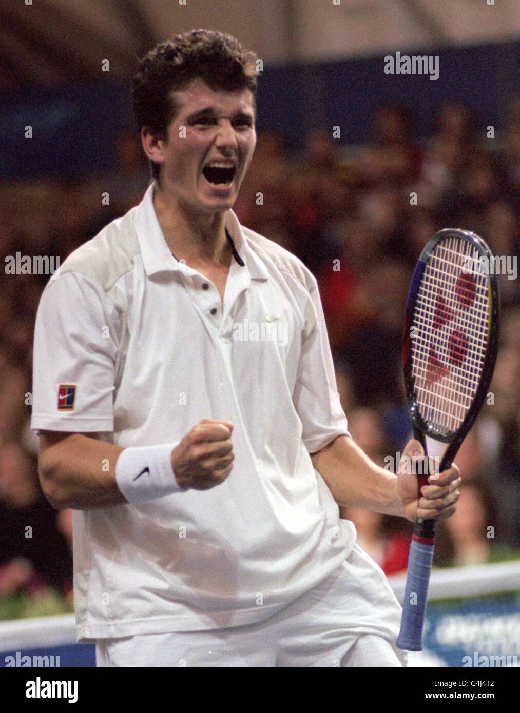 Richard Krajicek of the Netherlands celebrates on his way to victory ...