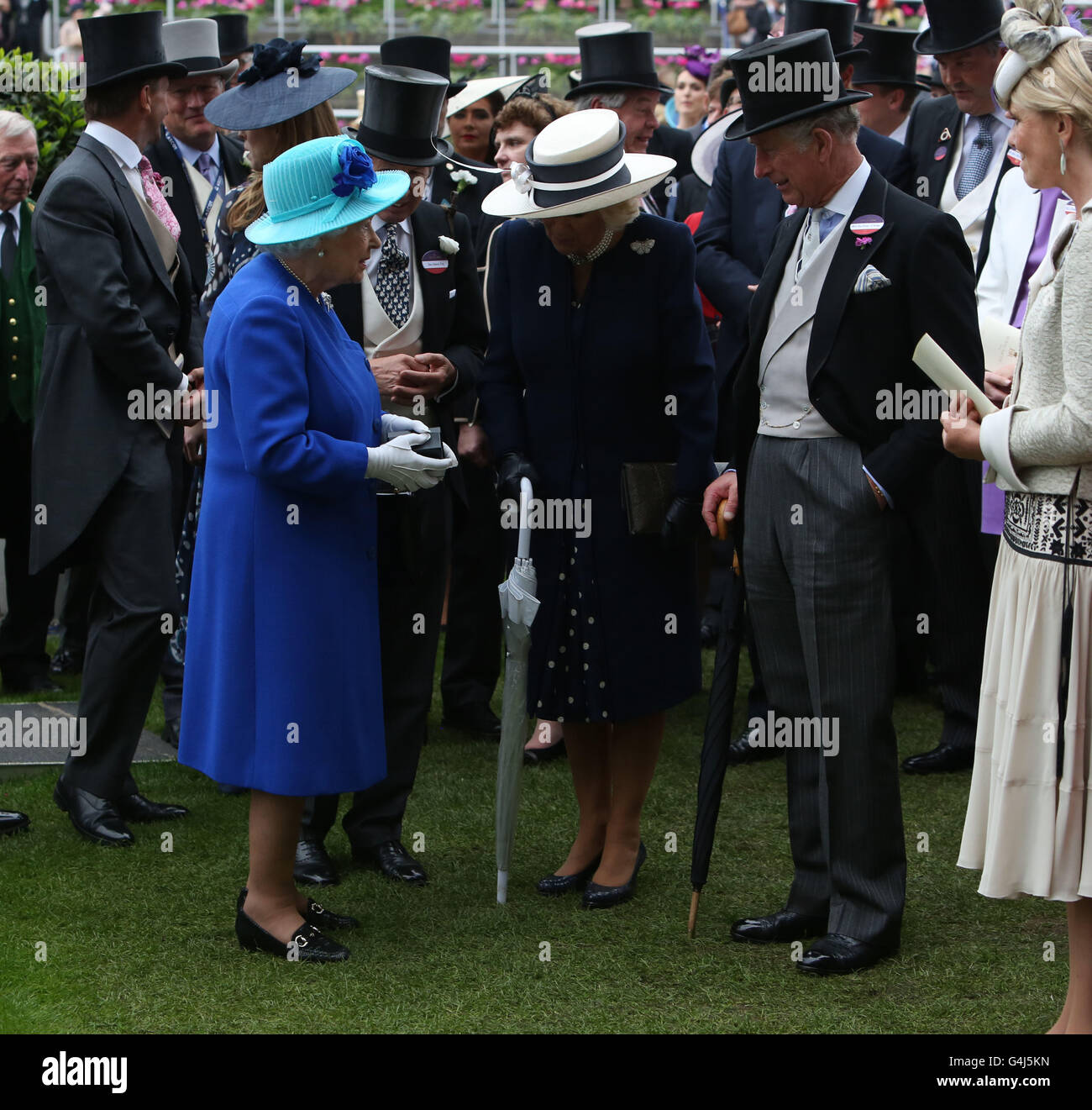 Queen Elizabeth II talks toPrince of Charles and the Duchess of ...