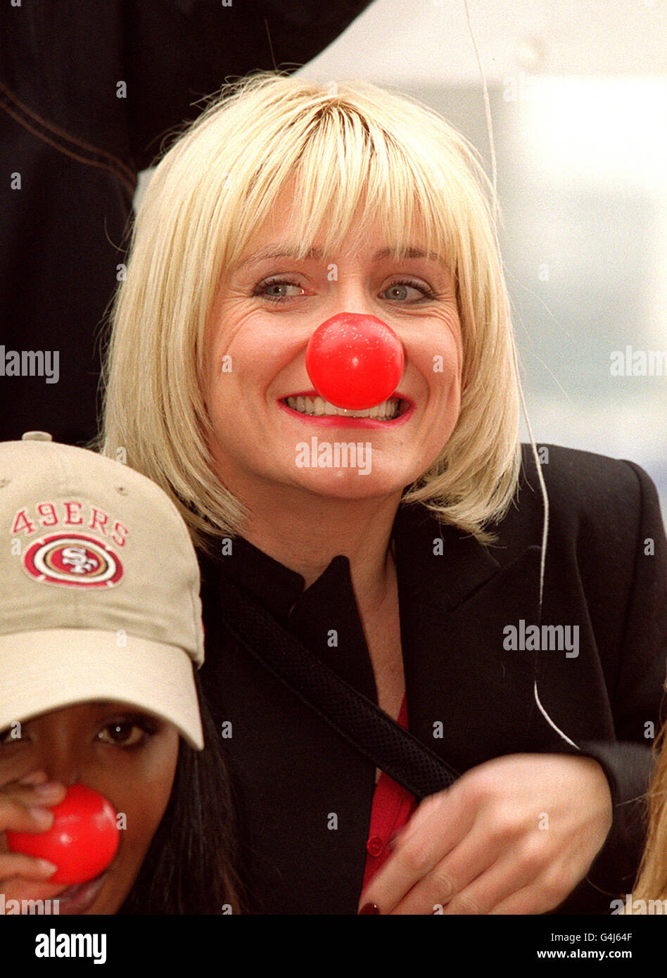 Actress Michelle Collins wearing a red nose as she gets ready to take ...