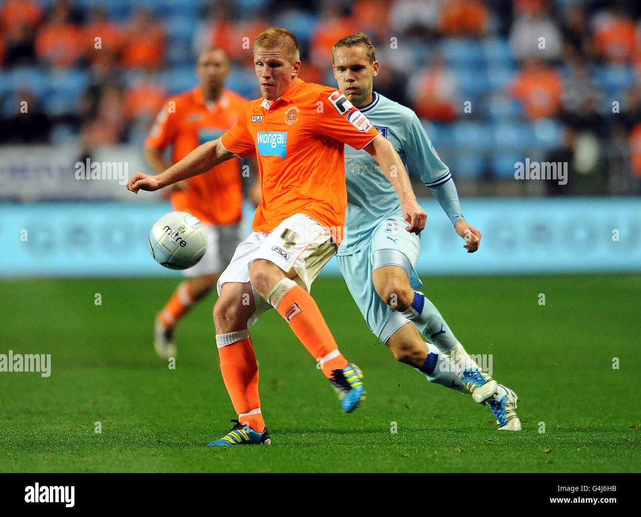 Coventry City's Chris Hussey (right) and Blackpool's Keith Southern ...