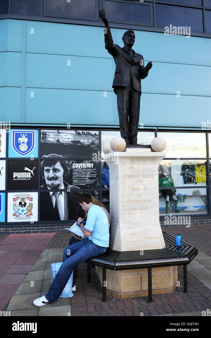 Coventry city fans sit at the jimmy hill statue hi-res stock ...