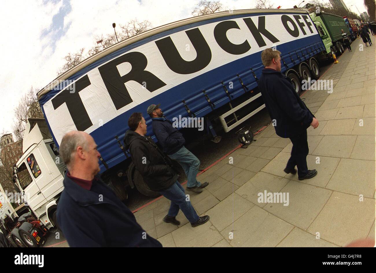 Drivers leave their vehicles and head to Parliament, as lorries line up ...