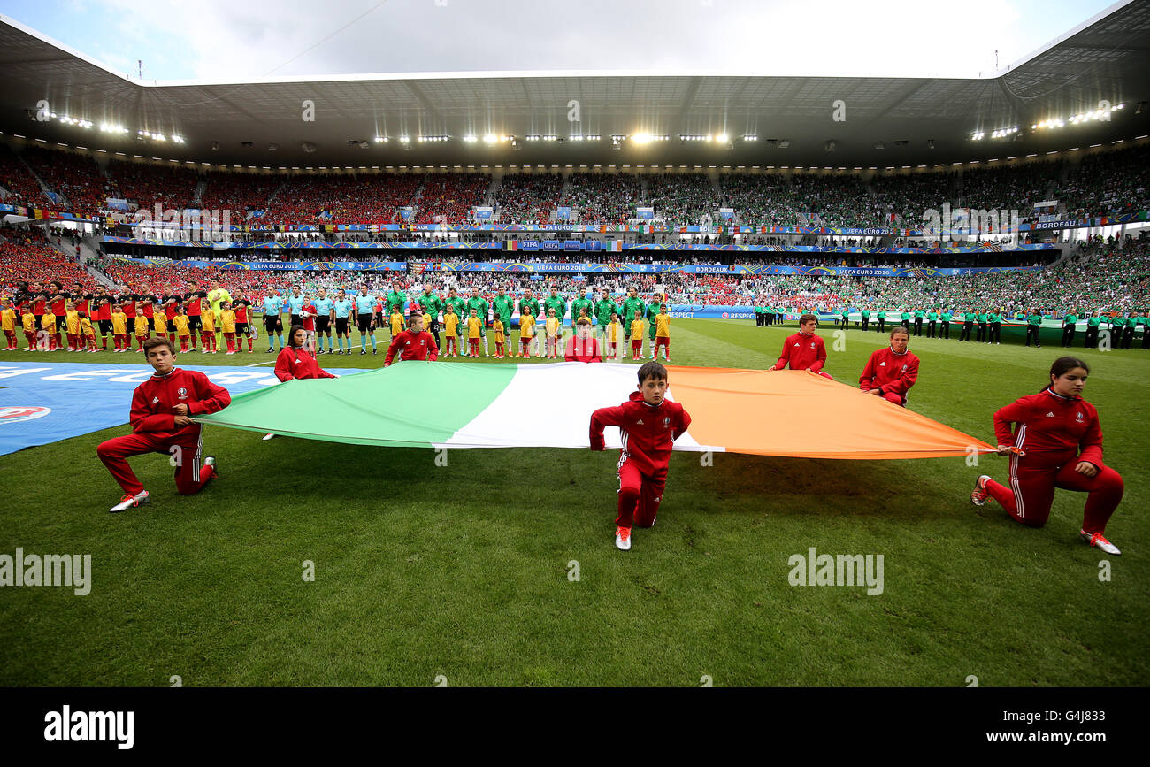 Mascots hold a Republic of Ireland flag as the two teams line-up for ...
