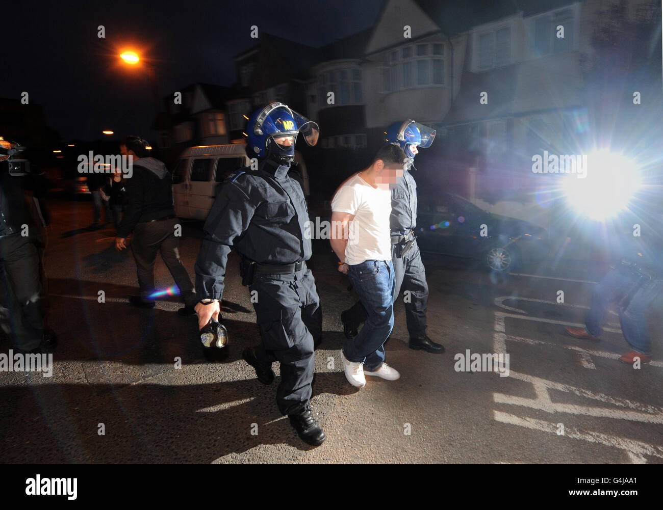 Police raids in Hackney Stock Photo - Alamy