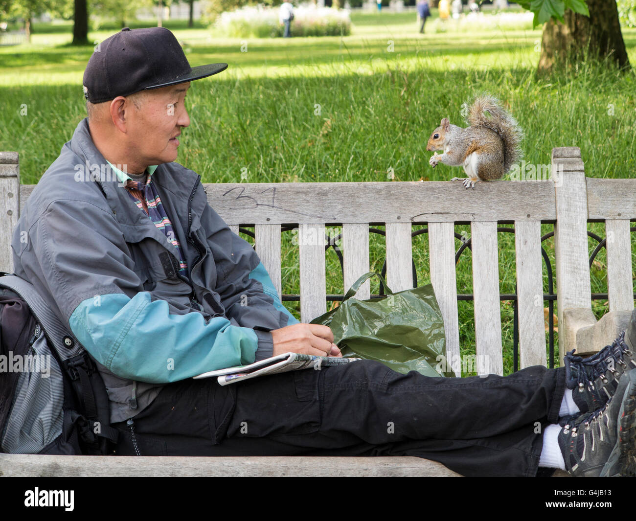 Old Man And Squirrel High Resolution Stock Photography and Images - Alamy